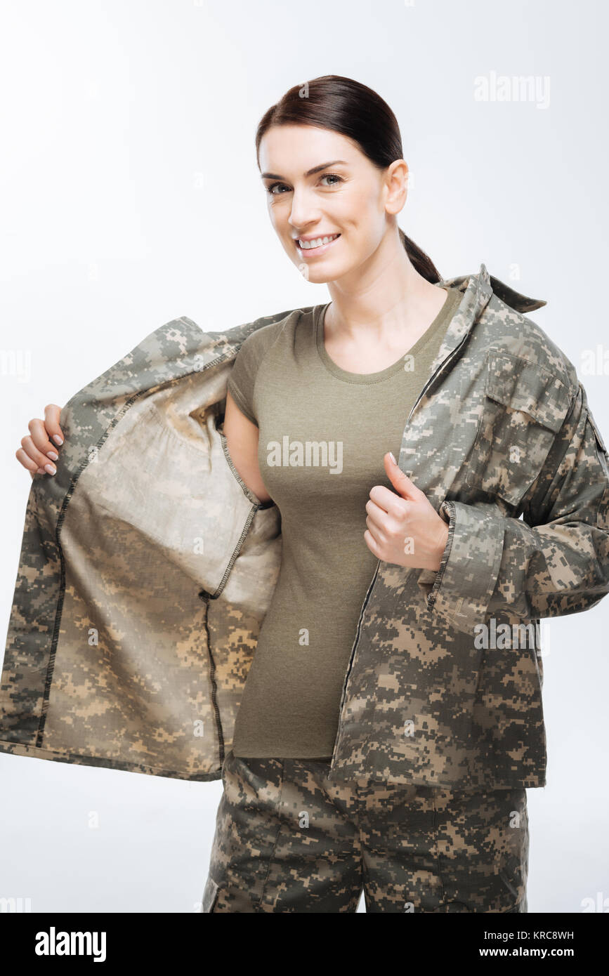Woman wearing camouflage military uniform hi-res stock photography and ...