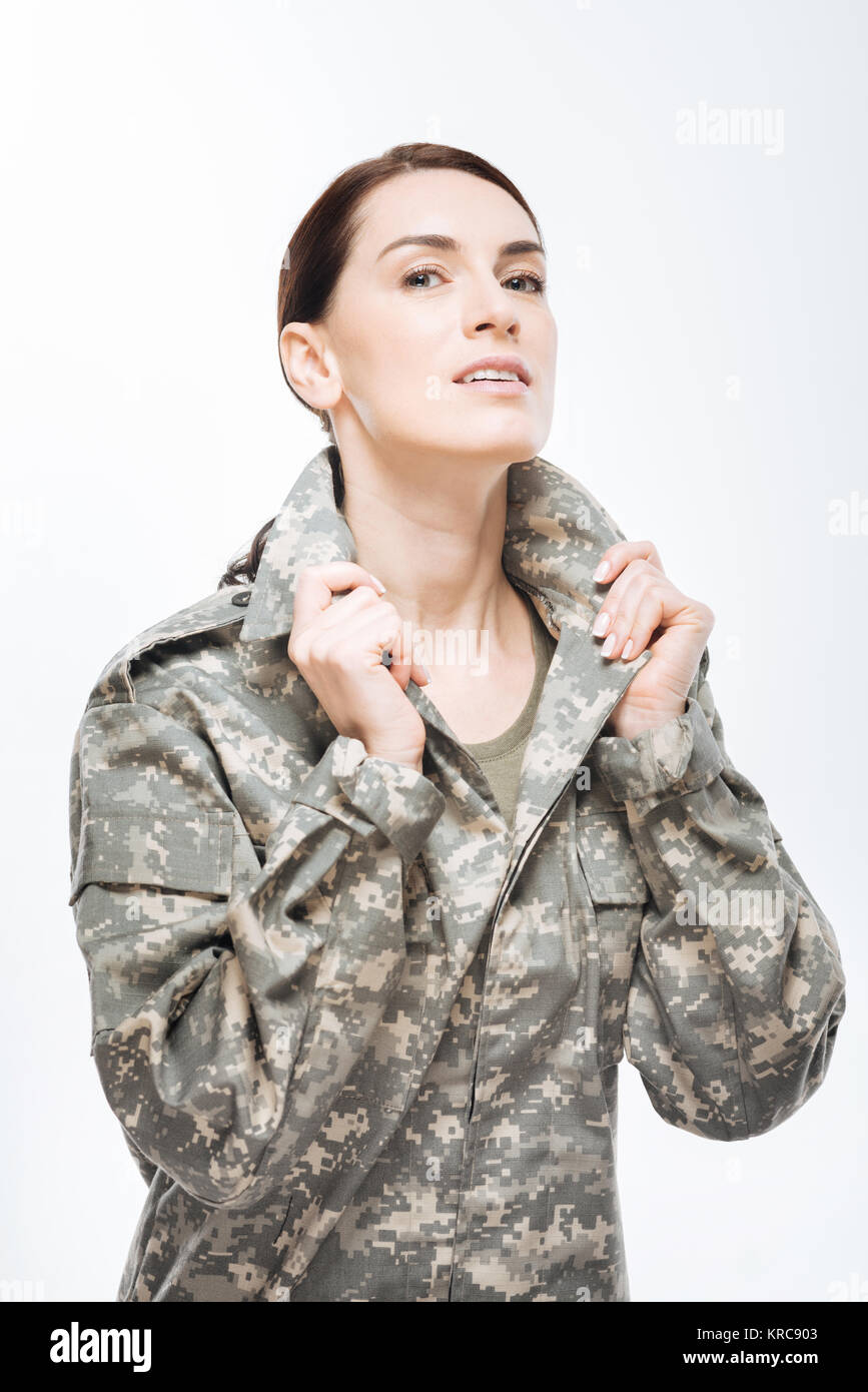 Musing glad woman serving her homeland Stock Photo - Alamy