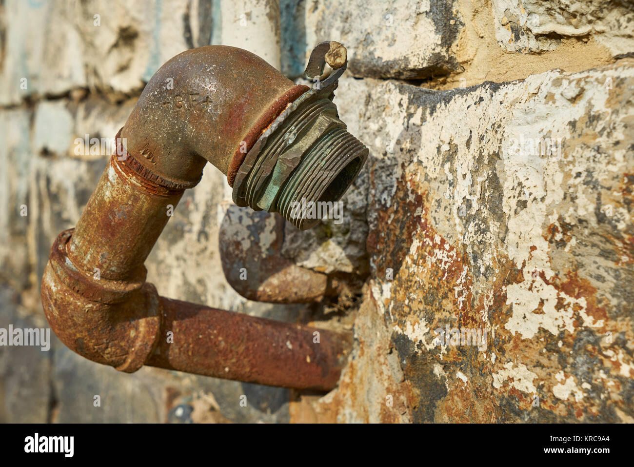 detail of pipe on exterior brick wall Stock Photo - Alamy