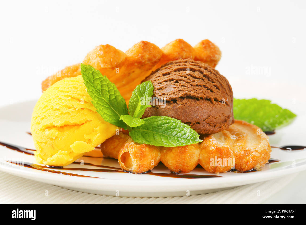 Ice cream with puff pastry biscuits Stock Photo - Alamy