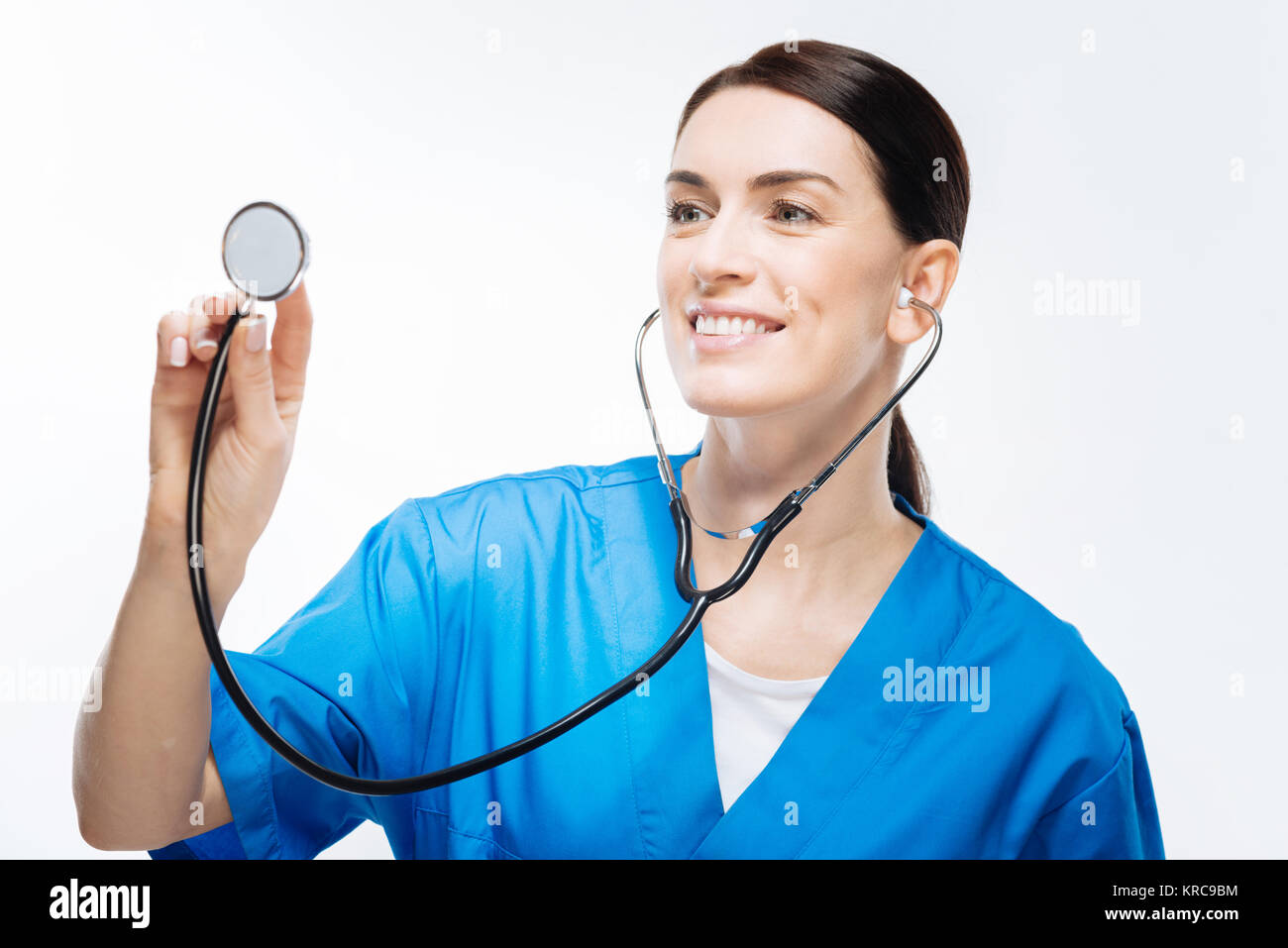 Professional female doctor demonstrating her skills Stock Photo - Alamy