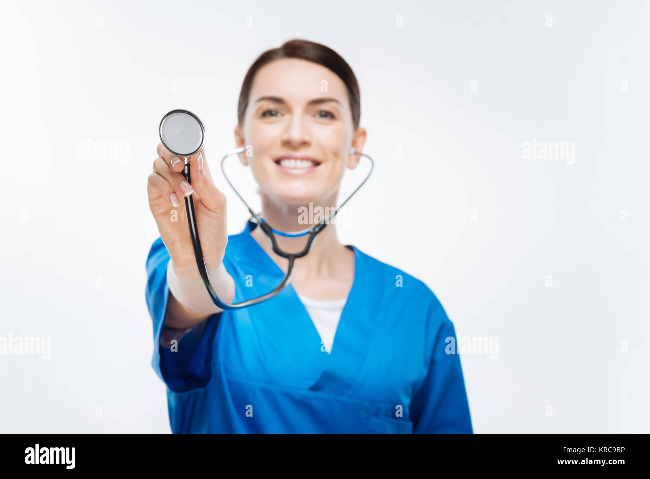 Vigorous female doctor curing people Stock Photo - Alamy