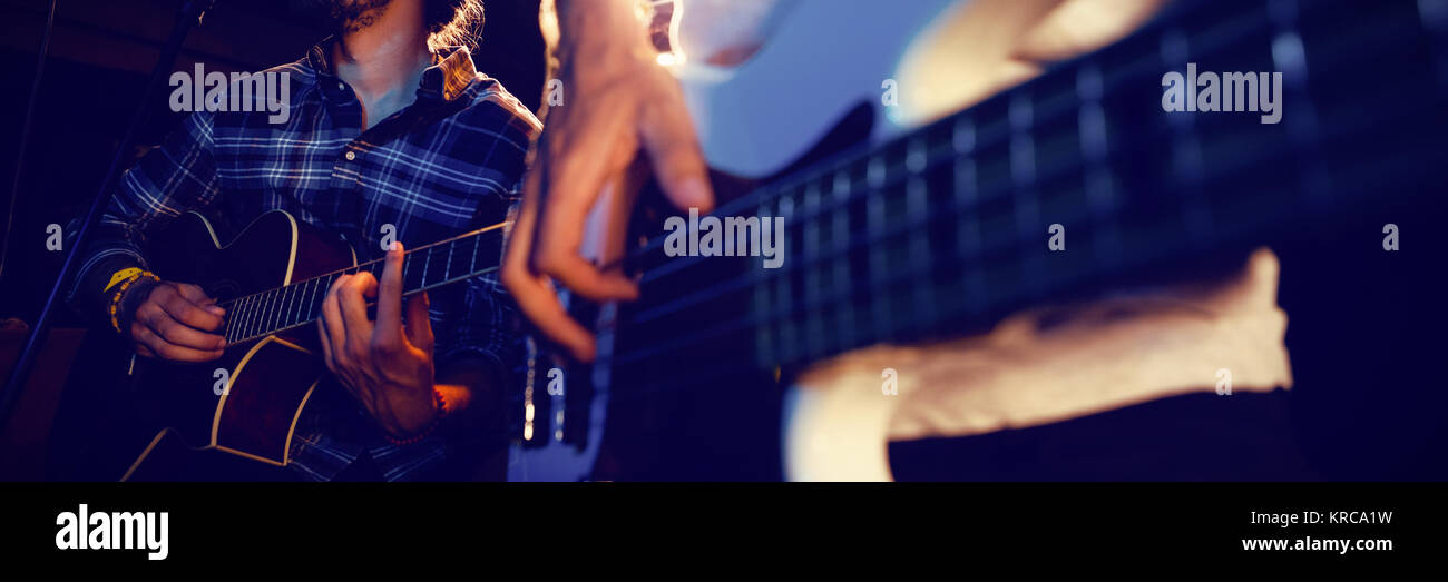 Band performing on stage in nightclub Stock Photo - Alamy