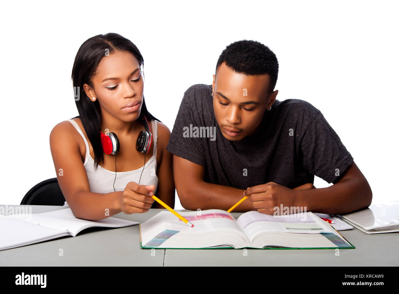 Students helping studying together Stock Photo - Alamy