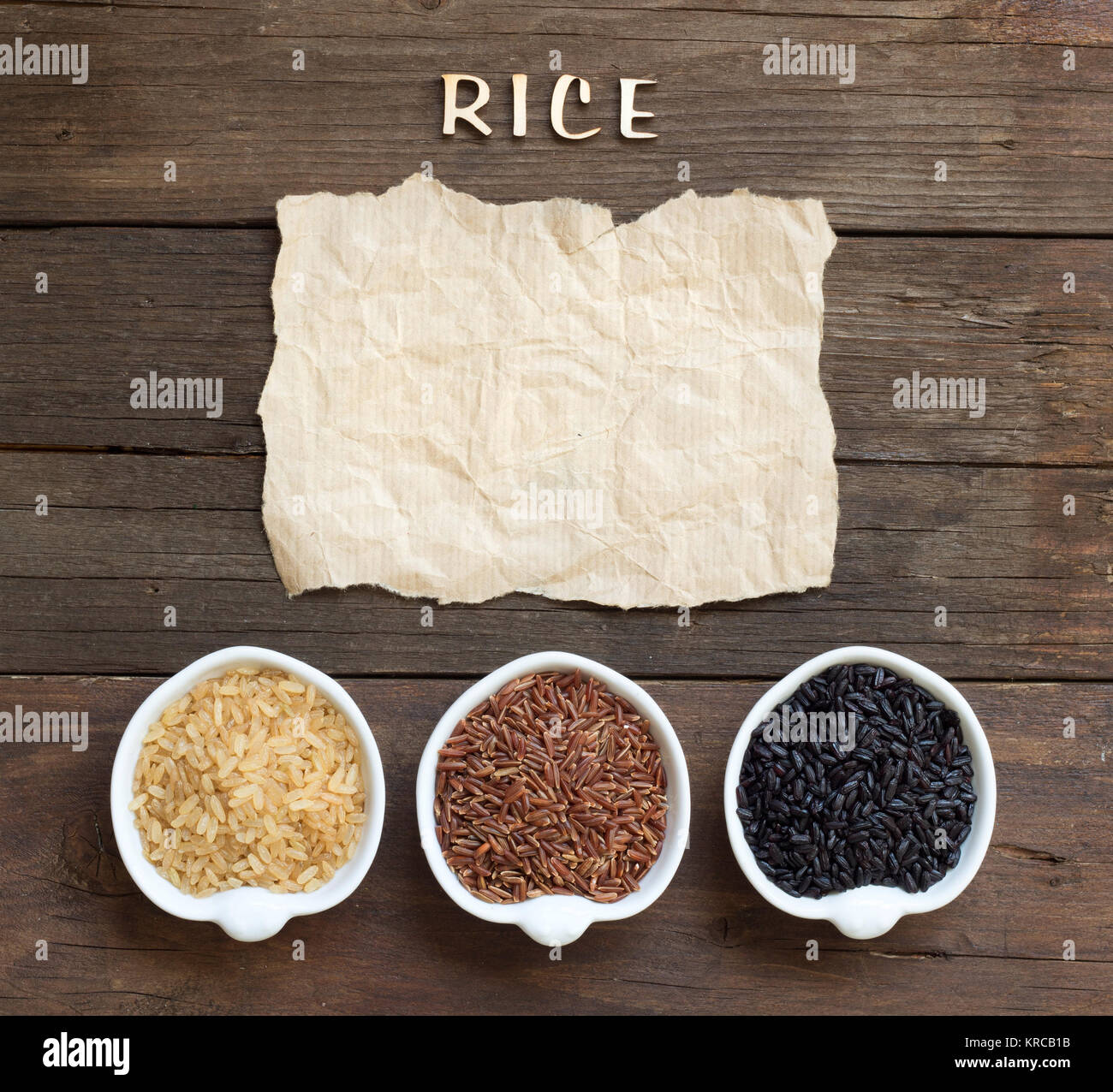 Variety of rice with craft paper and word Rice Stock Photo - Alamy