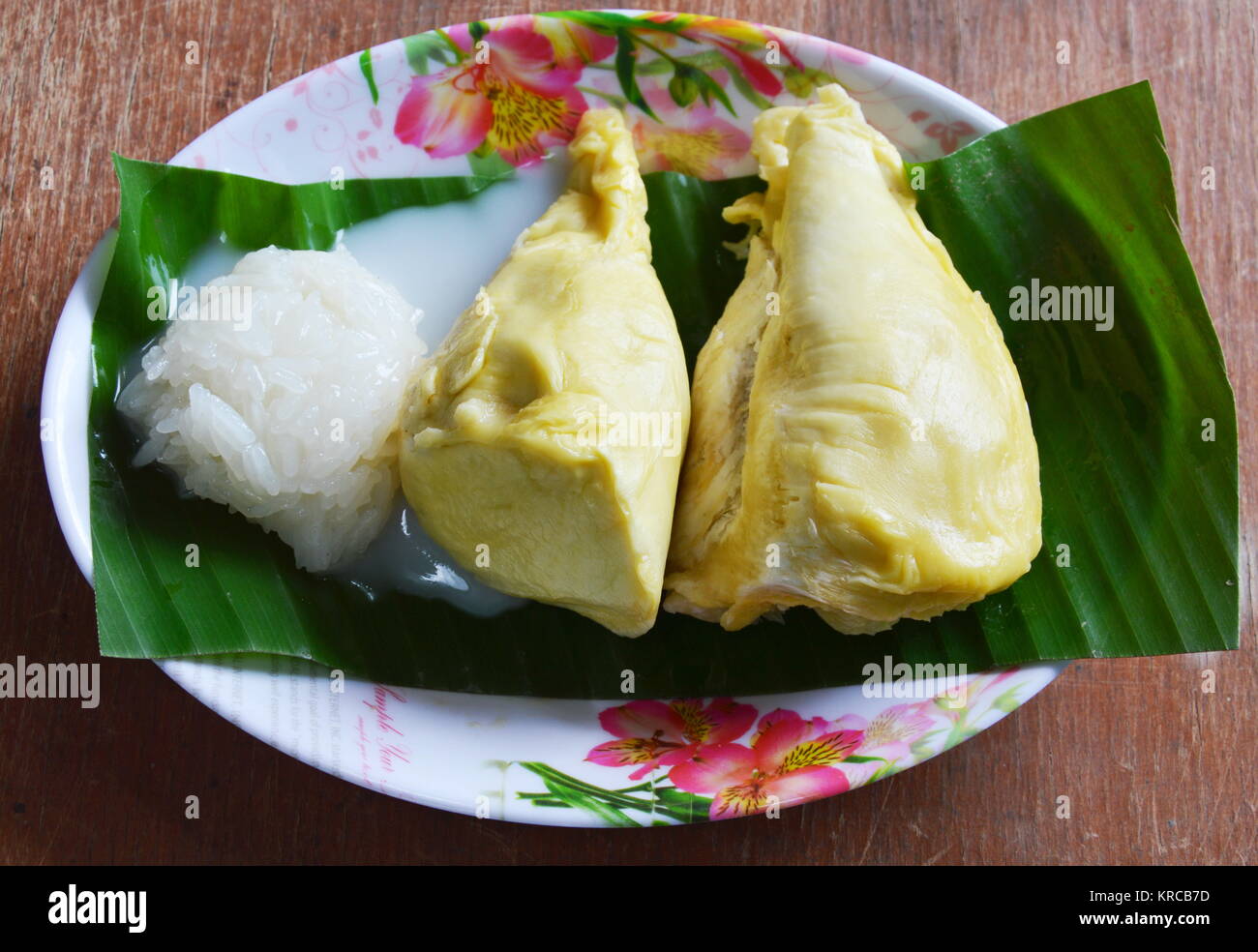 durian and sticky rice dressing with coconut milk Stock Photo - Alamy