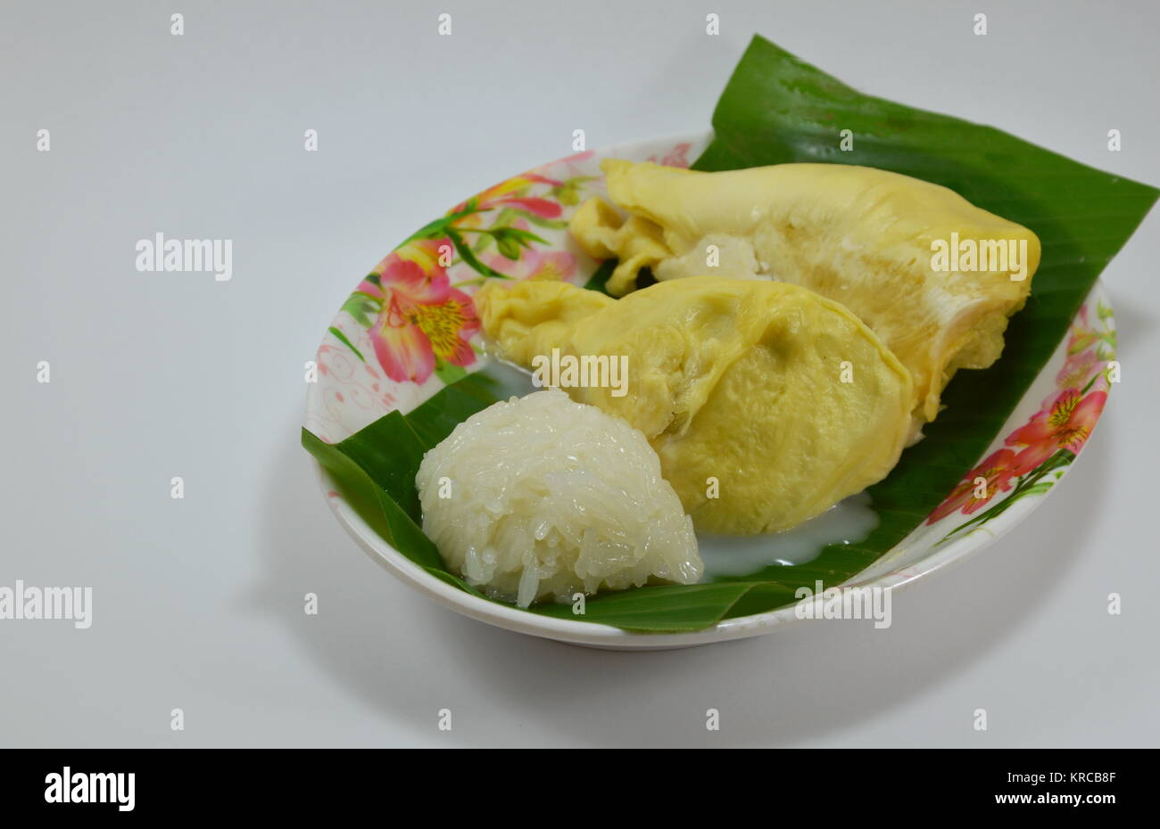 durian and sticky rice dressing with coconut milk Stock Photo - Alamy