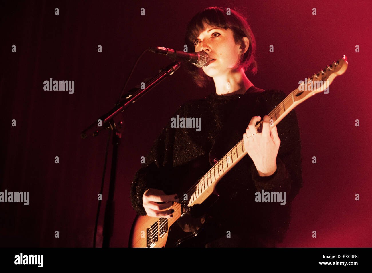 Singer and musician Elena Tonra pictured live on stage playing guitar ...