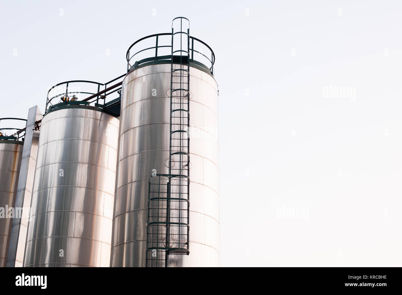 Stainless steel silos in the chemical industry Stock Photo - Alamy