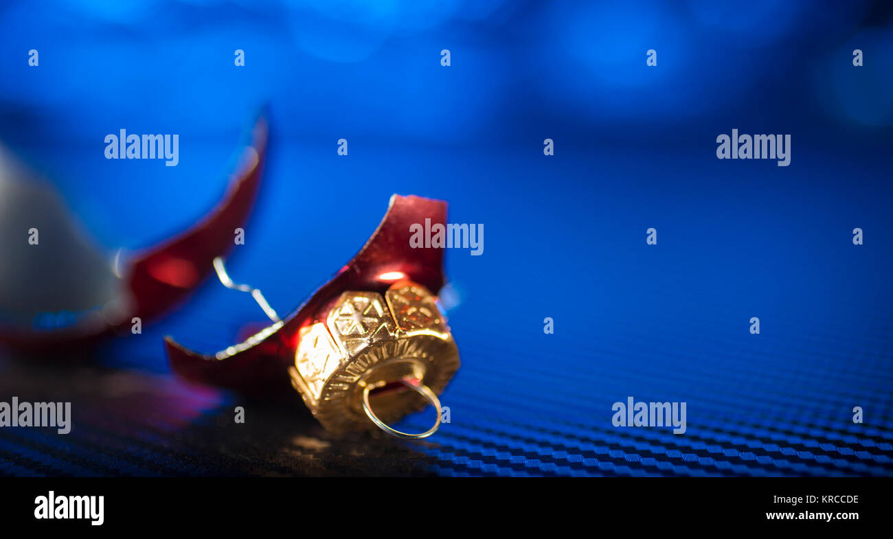 Broken ornament at Christmas adding to the stress Stock Photo - Alamy