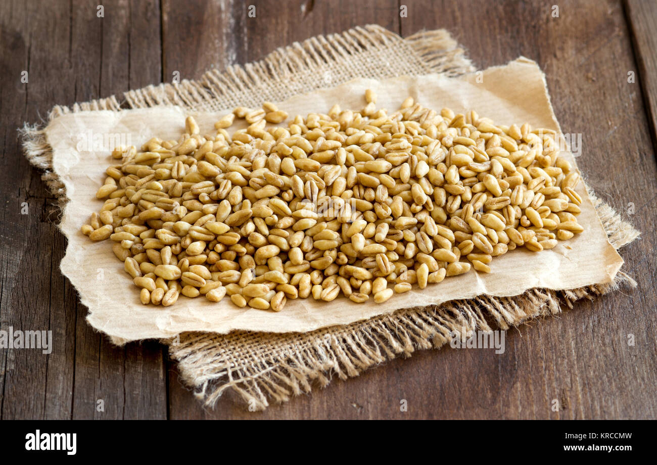 Raw organic spelt Stock Photo - Alamy