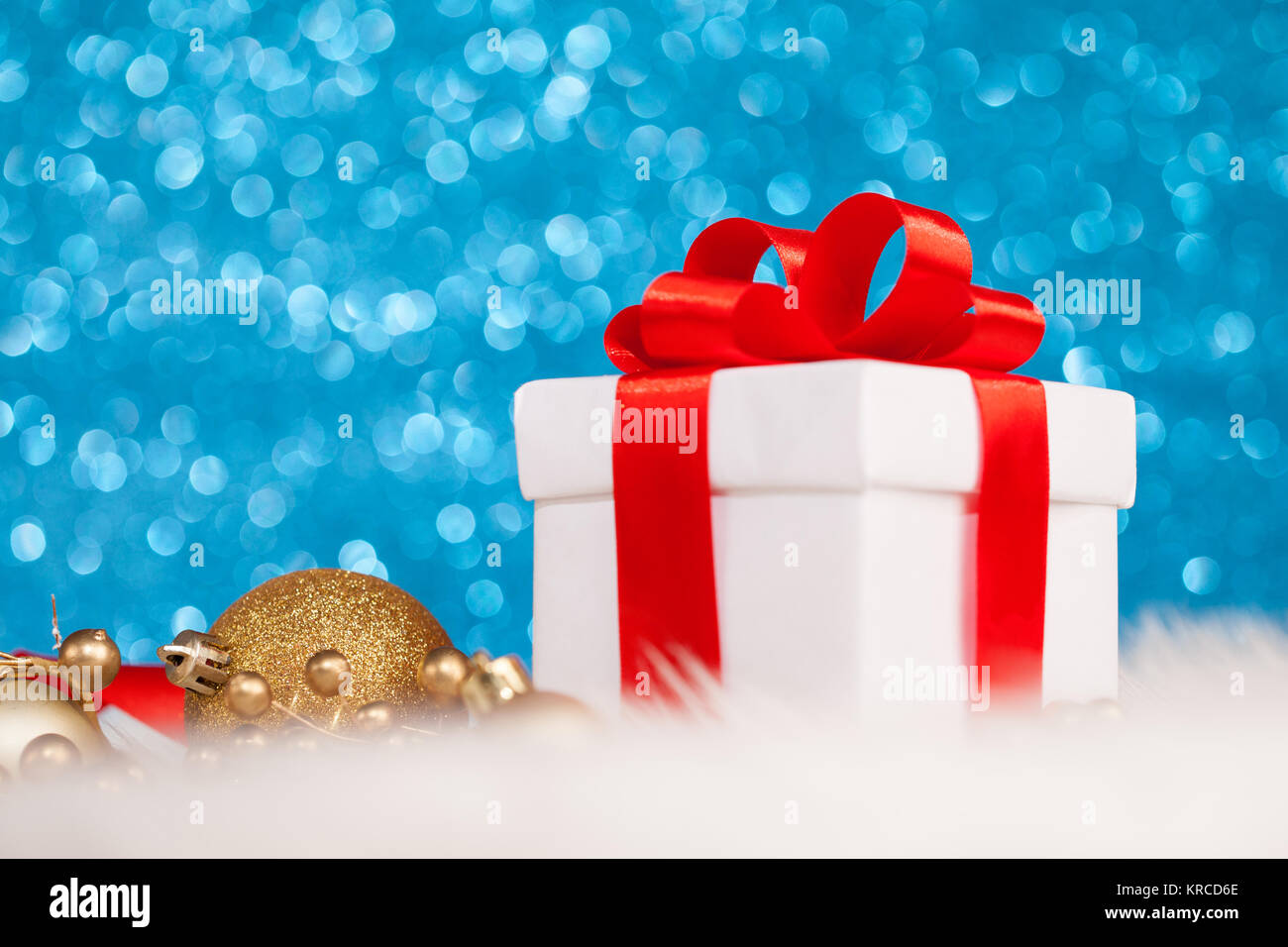 Christmas gift boxes in shiny blue night Stock Photo - Alamy
