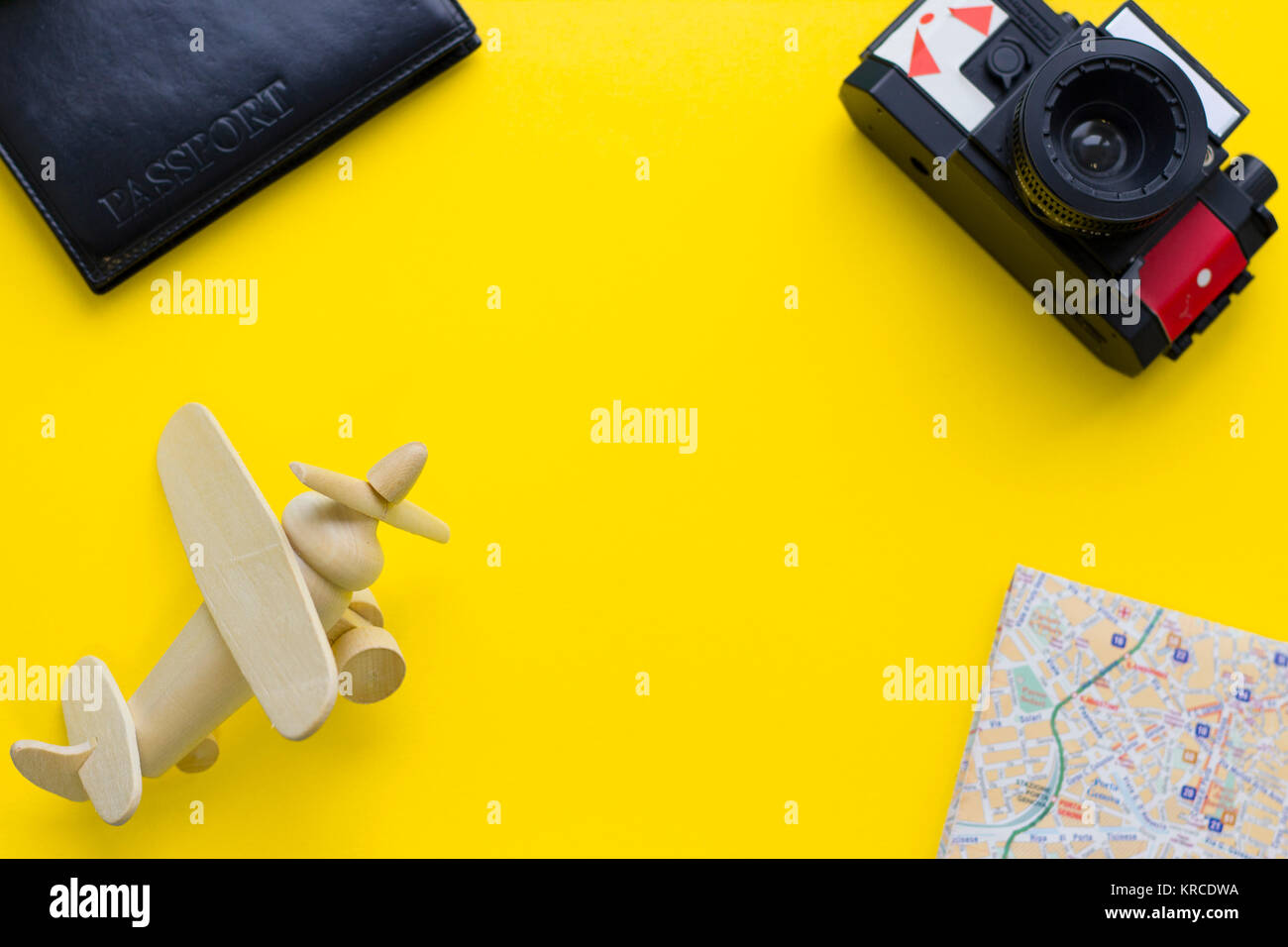 Vacation plans. Bright yellow one-color background with tourist's ...