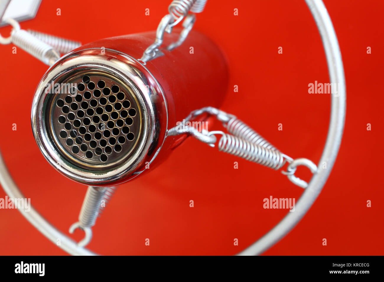 Vintage old round studio voice microphone over red Stock Photo - Alamy