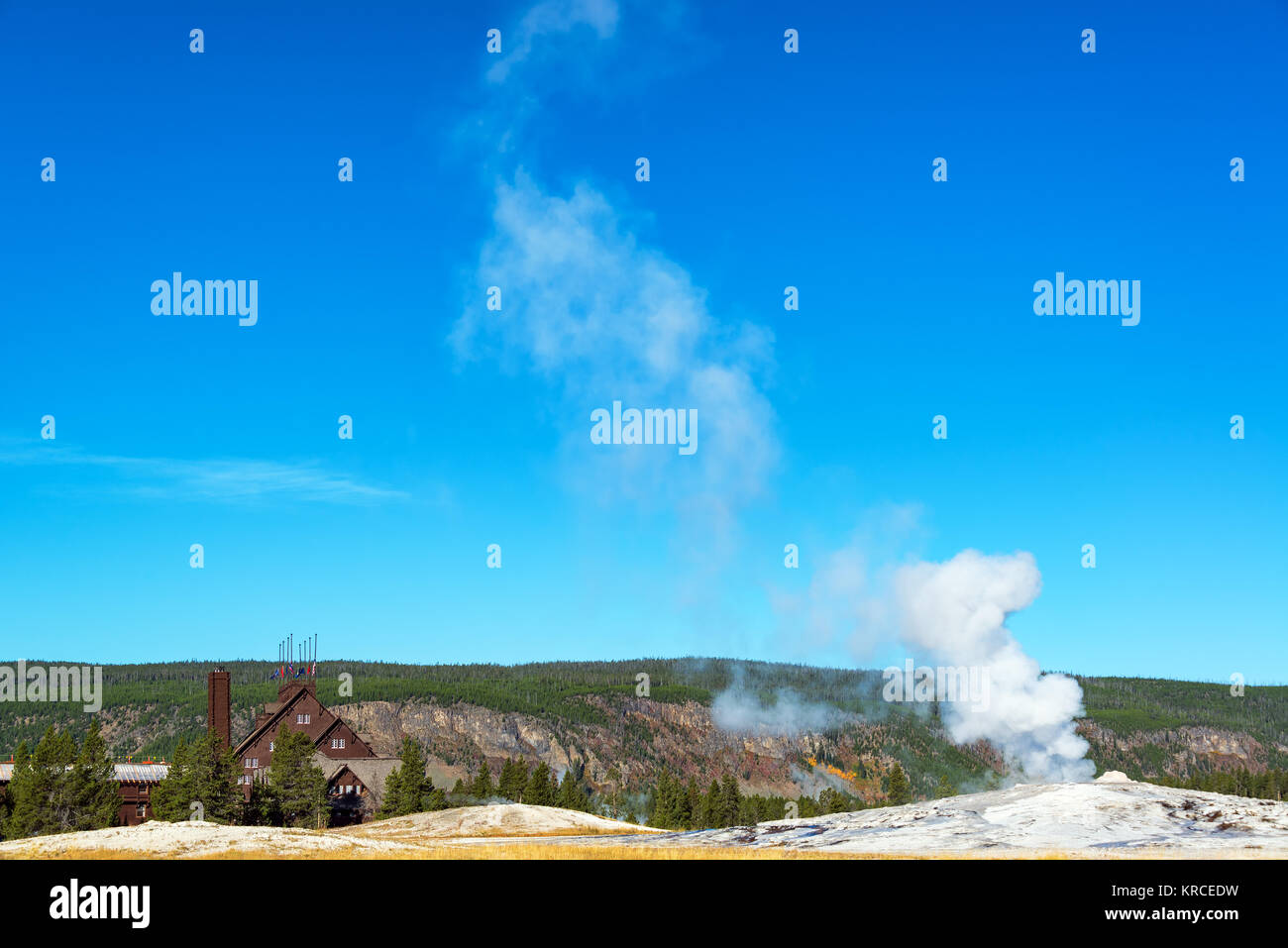 Old Faithful Geyser and Lodge Stock Photo - Alamy