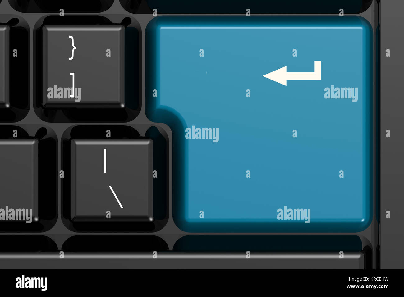 Blue enter key on black keyboard Stock Photo - Alamy