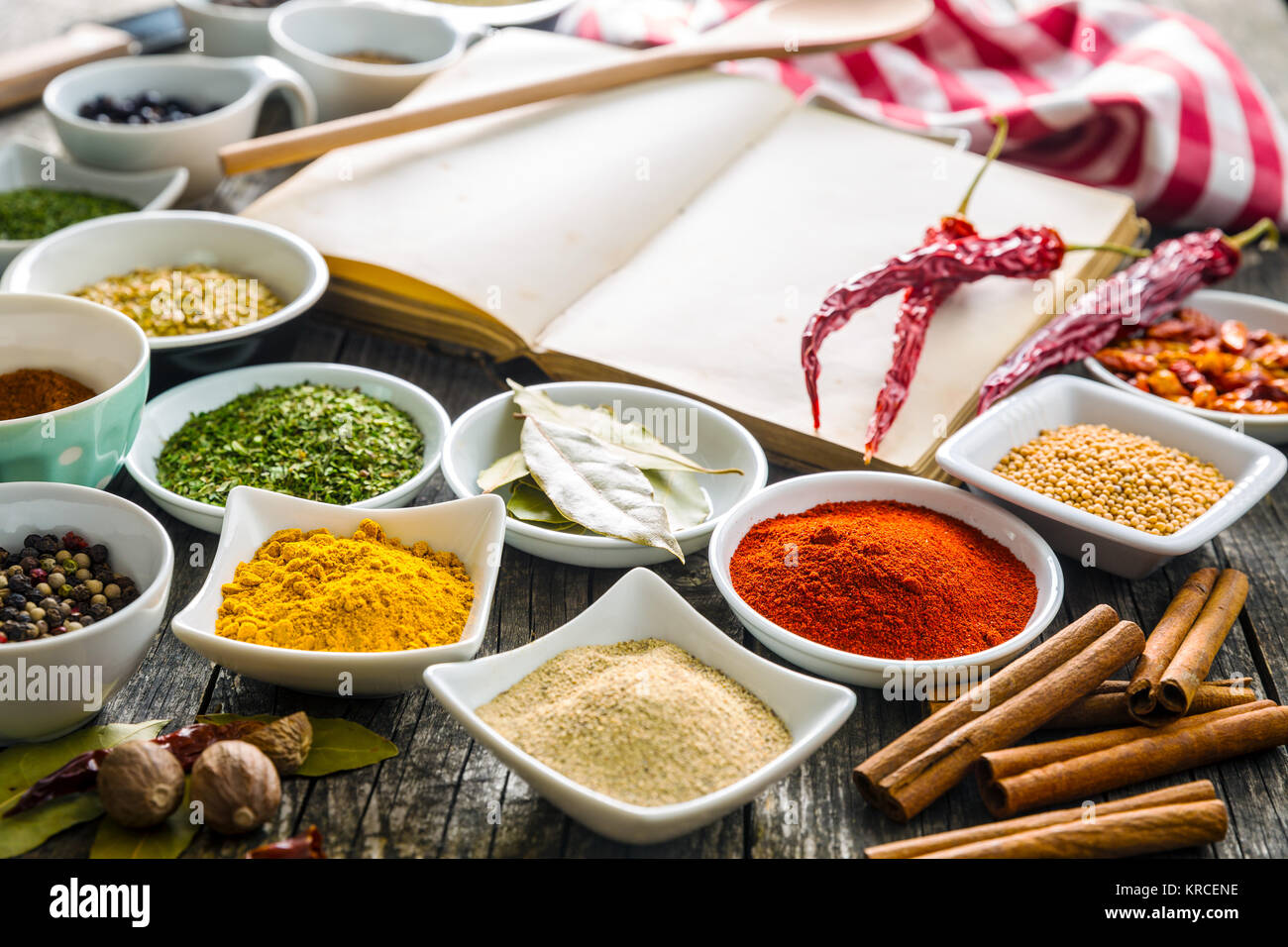 Various spices and blank cookbook Stock Photo - Alamy