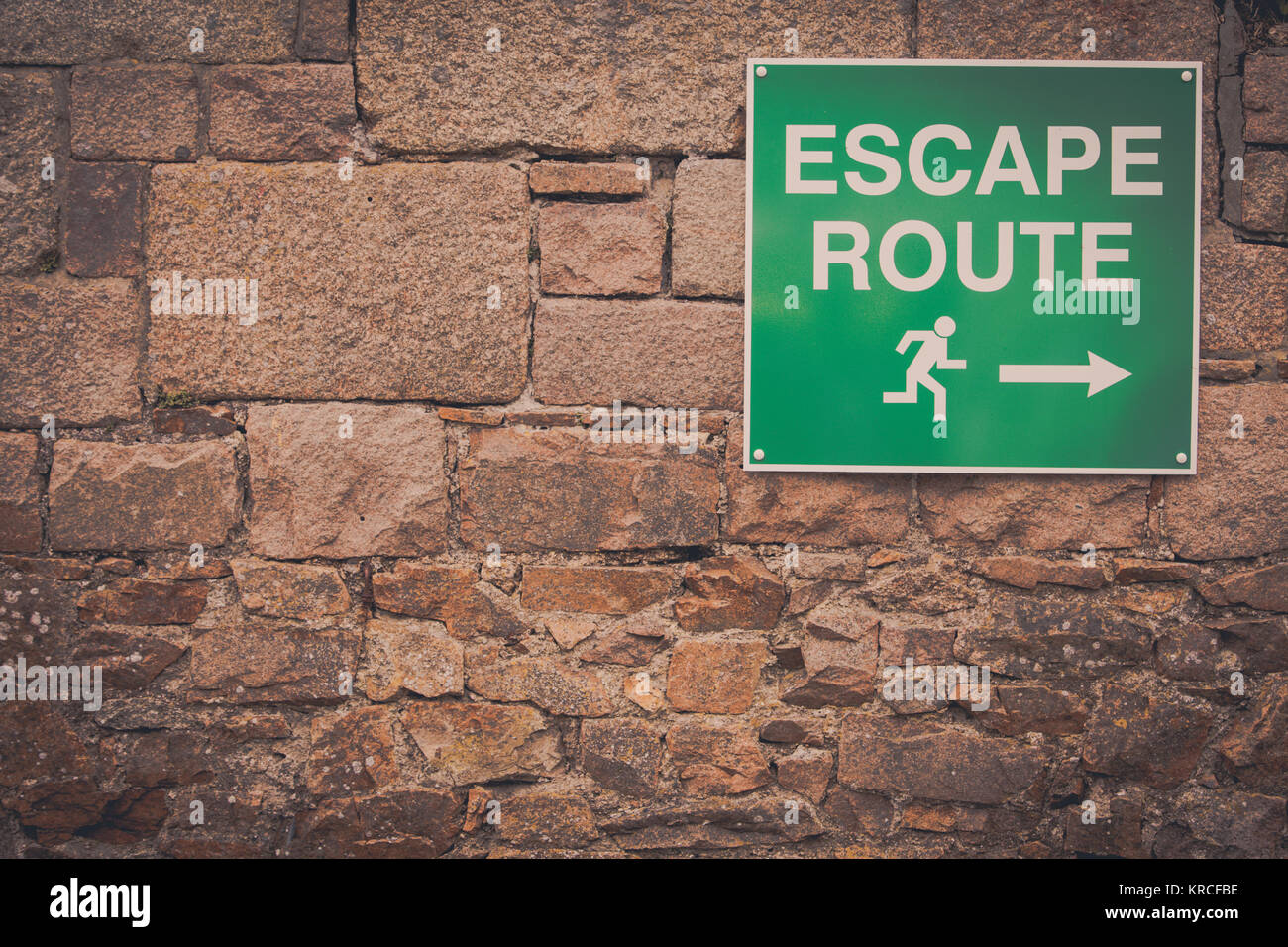 Escape route indicator Stock Photo - Alamy
