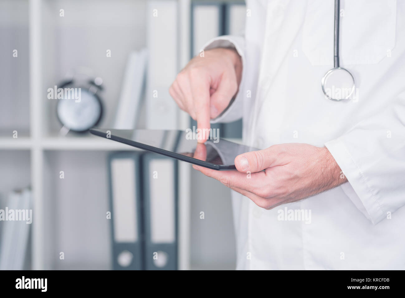 Modern technology in healthcare and medicine. Male doctor using digital ...