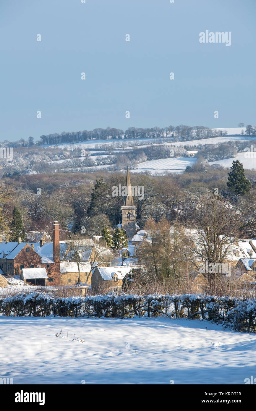 Lower Slaughter village in the snow with blue sky in December. Lower ...