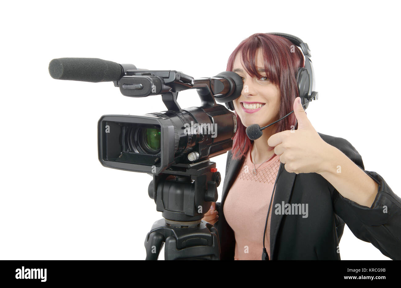 young woman with a professional video camera Stock Photo - Alamy