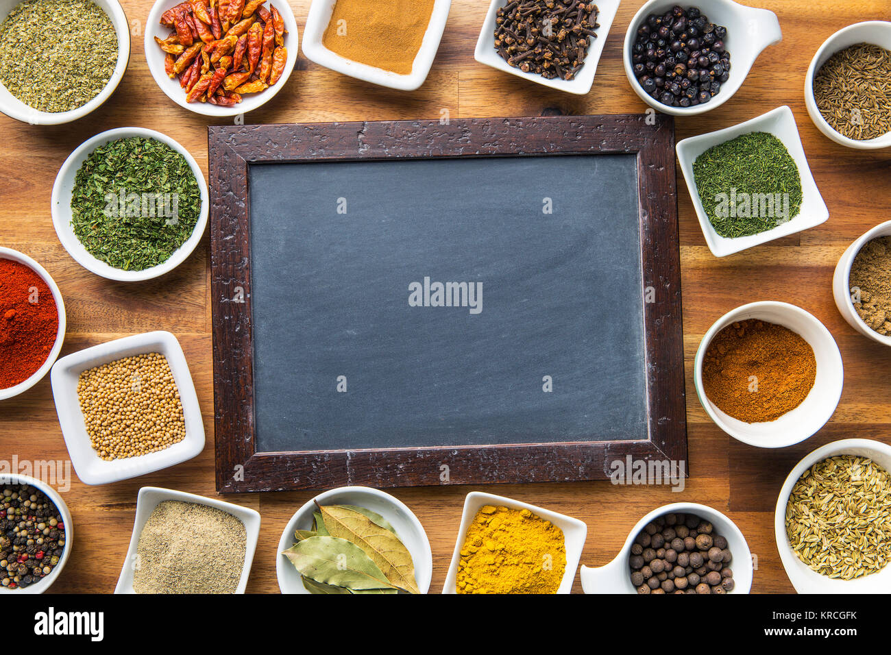 Blank chalkboard and various spices Stock Photo - Alamy