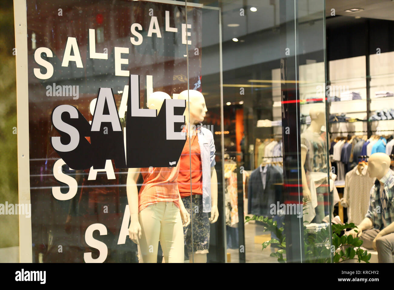 sale sign on shop display Stock Photo - Alamy