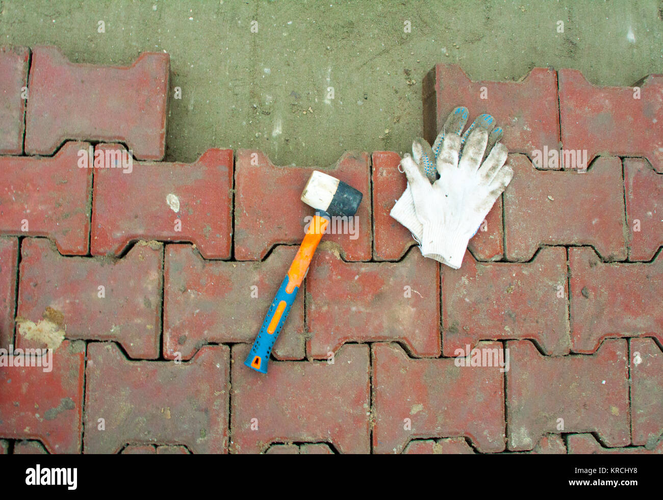 the master paves the paving slab professionally Stock Photo - Alamy