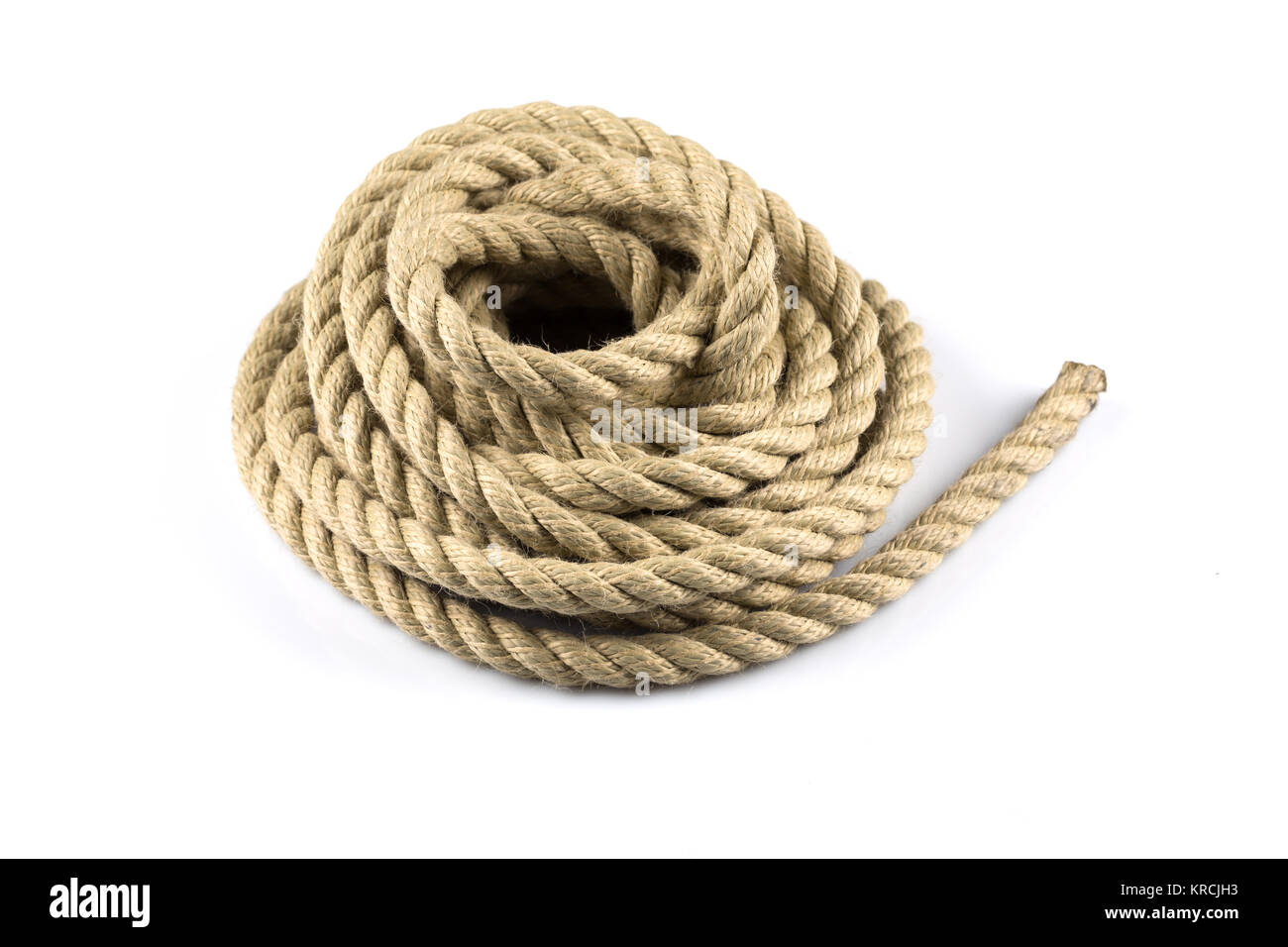 Twisted thick rope on white Stock Photo - Alamy