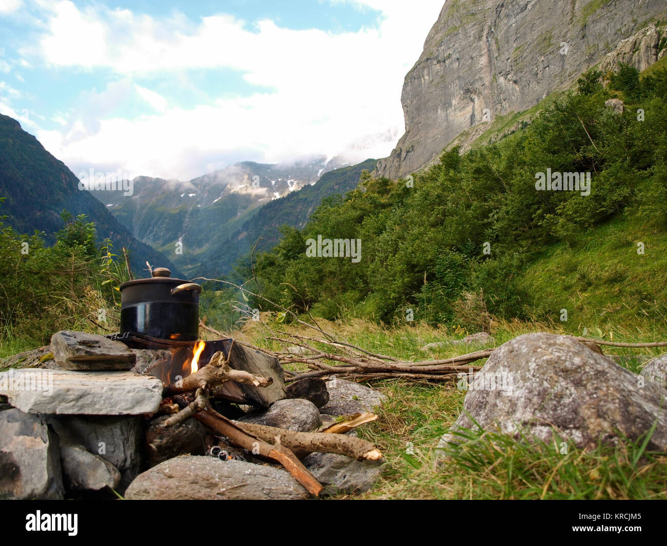 pot over fire on the nature Stock Photo - Alamy