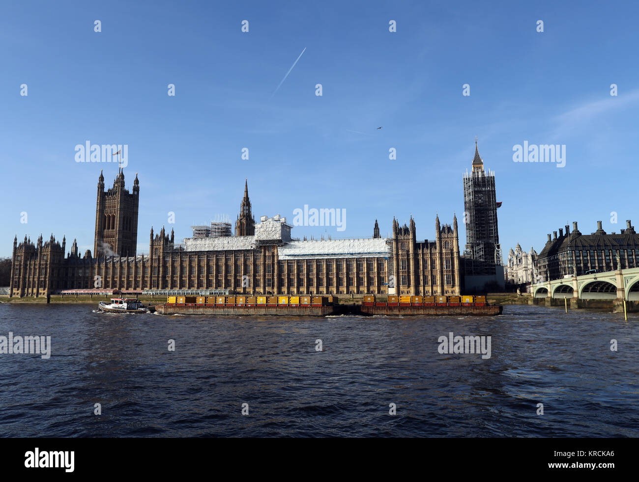 Parliament House of Commons with Cory waste going past in containers ...
