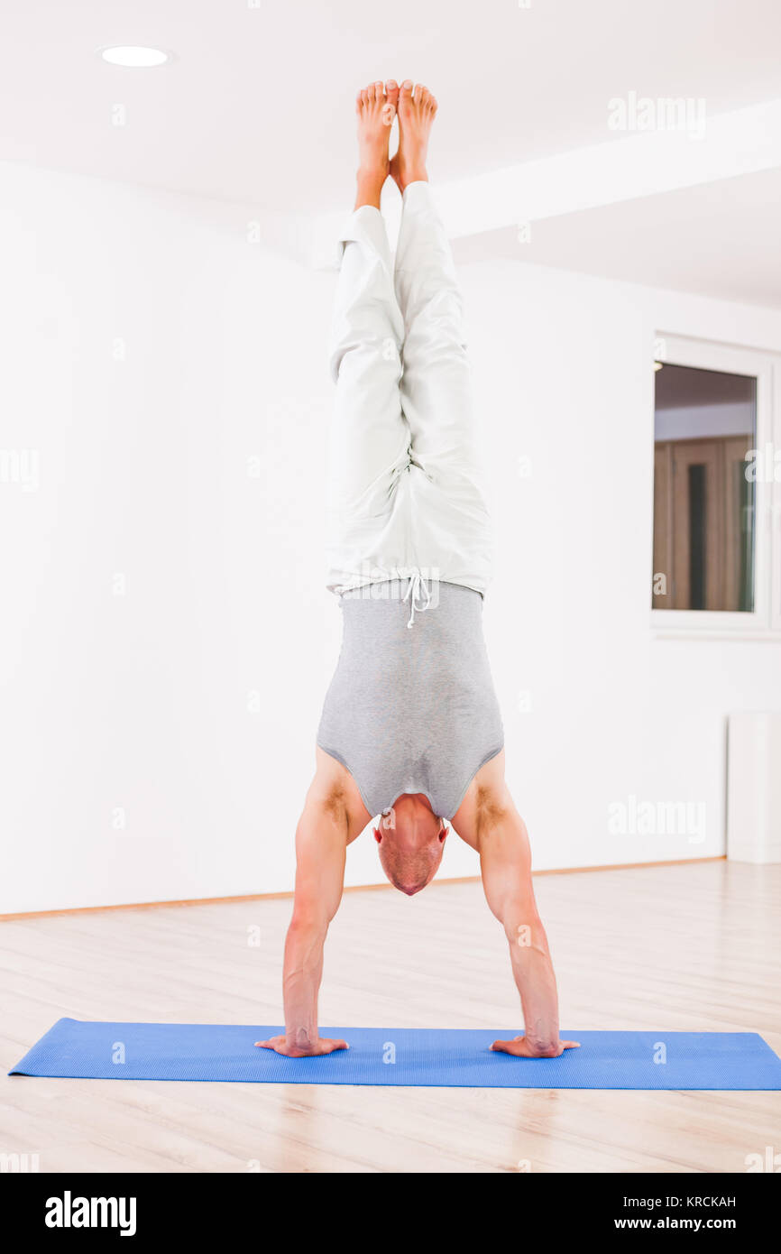 Practicing Handstand High Resolution Stock Photography and Images - Alamy