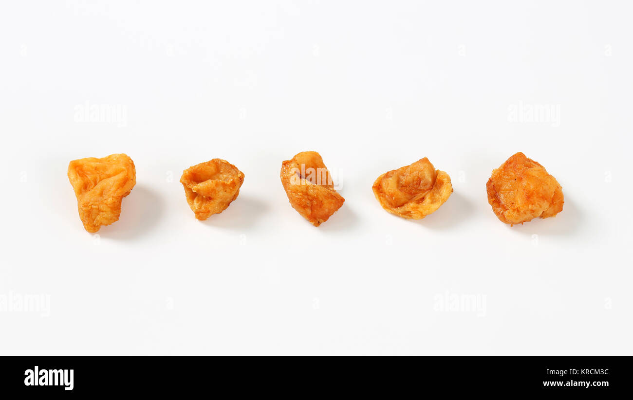 Fried pieces of pork rind and fat Stock Photo - Alamy