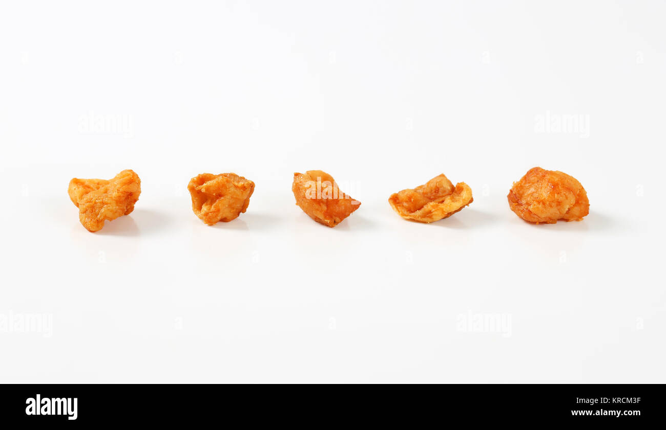 Fried pieces of pork rind and fat Stock Photo - Alamy