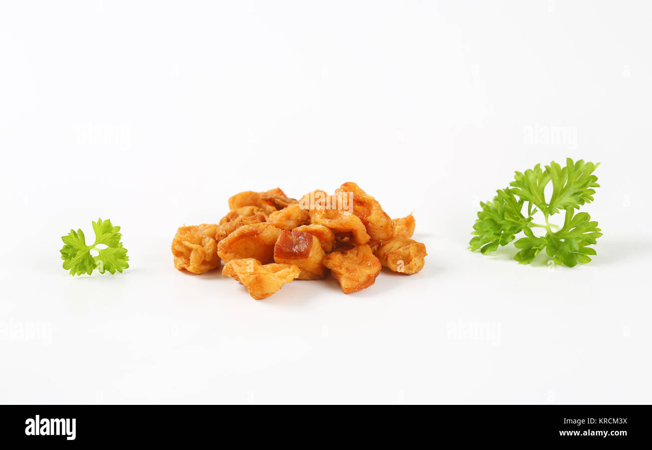 Fried pieces of pork rind and fat Stock Photo - Alamy