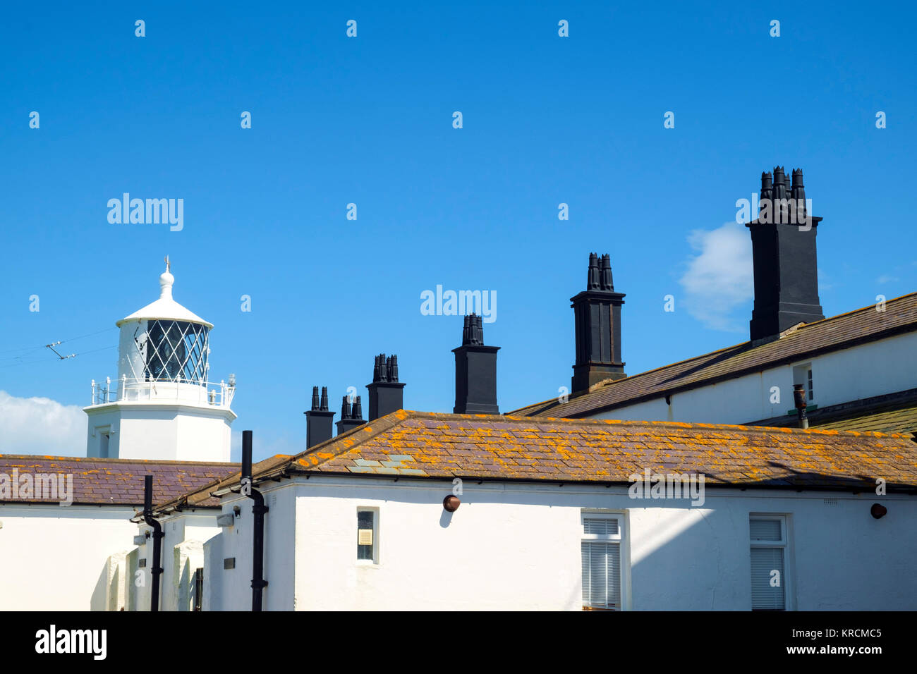 Architectural details, black painted chimney stacks contrast with white ...