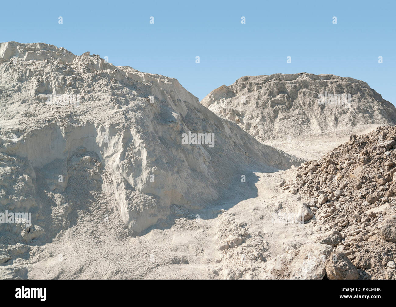 sunny illuminated light brown heap of earth Stock Photo - Alamy