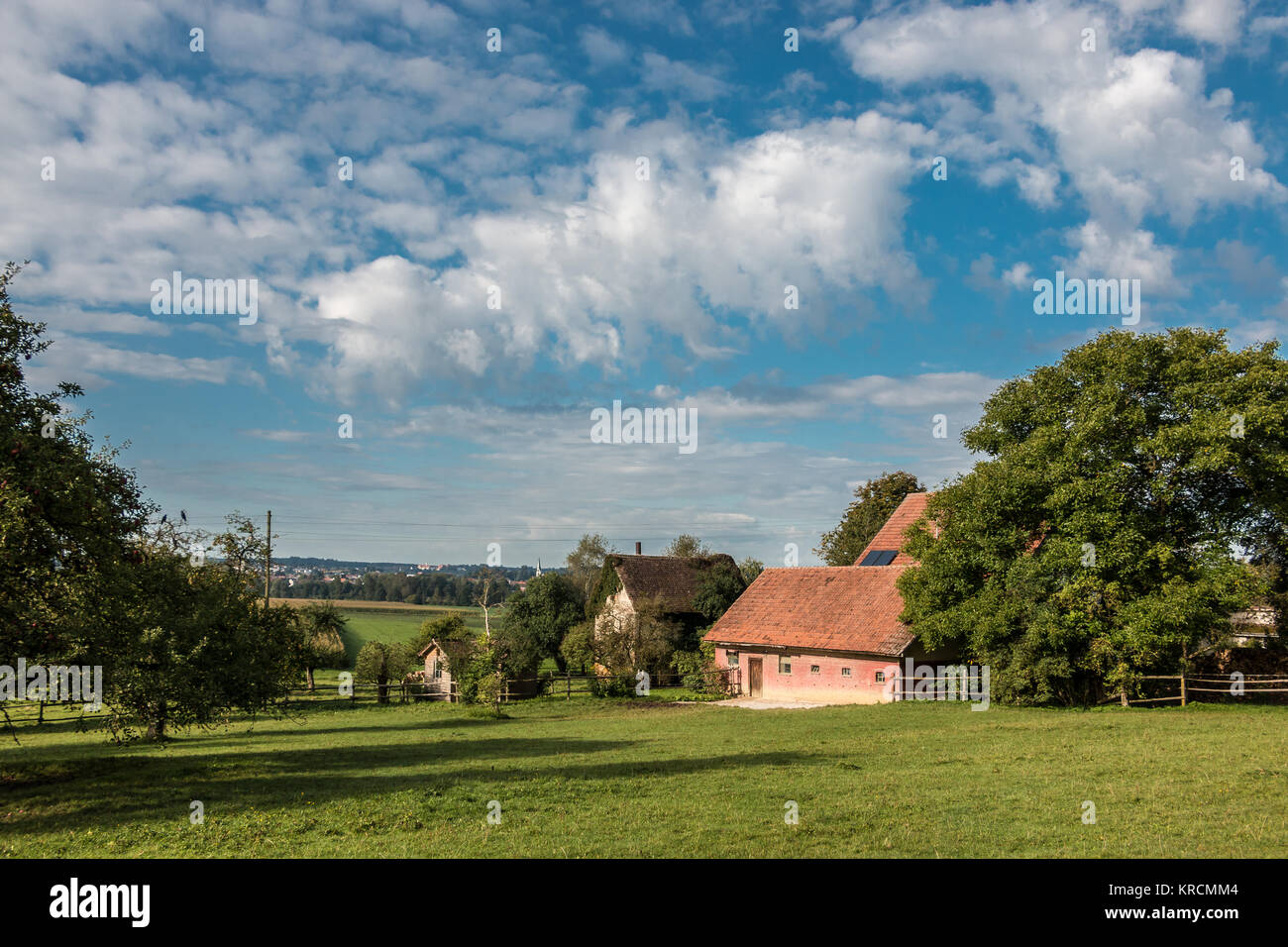 Farms, green fields, green meadows and trees Stock Photo - Alamy