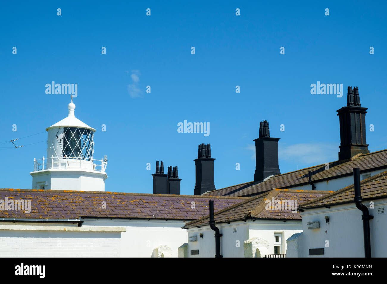 Architectural details, black painted chimney stacks contrast with white ...