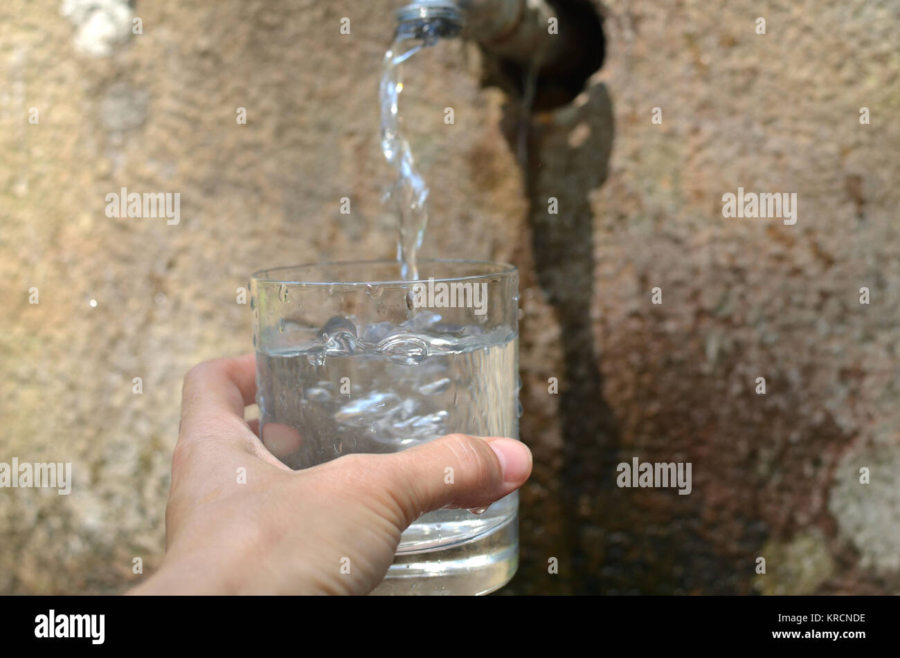 Glass of unpolluted mineral water from a spa water source Stock Photo ...