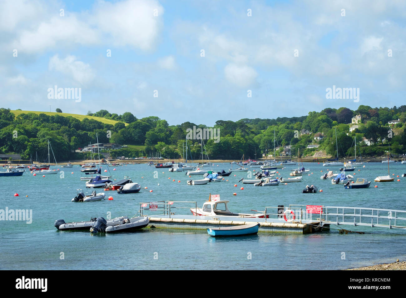 View across the picturesque Helford River, to where many small boats ...