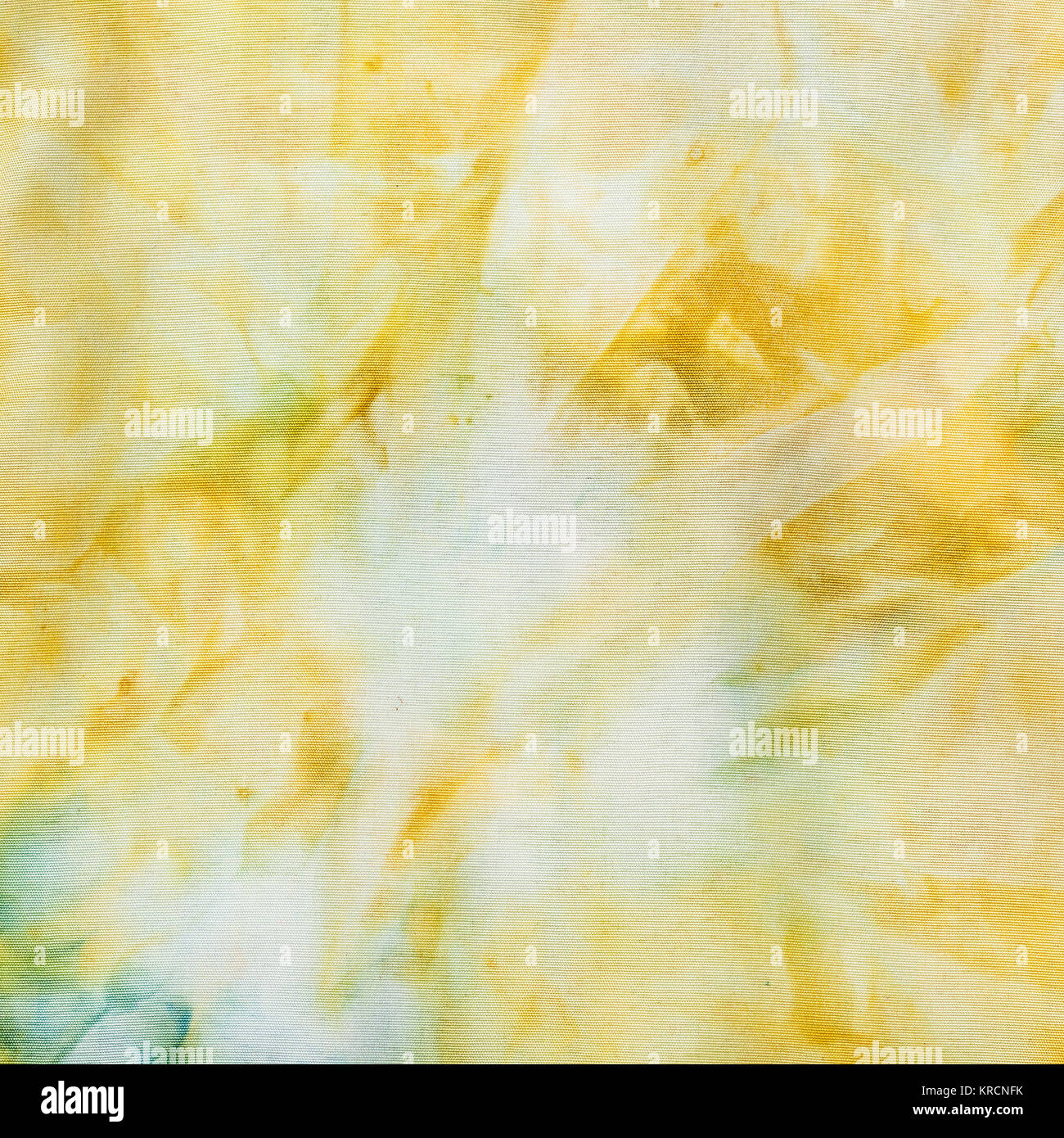 abstract yellow colored silk batik Stock Photo - Alamy