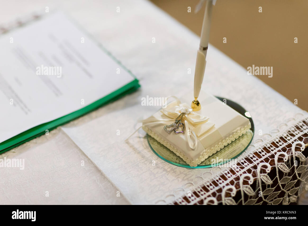 book with wedding rings Stock Photo - Alamy