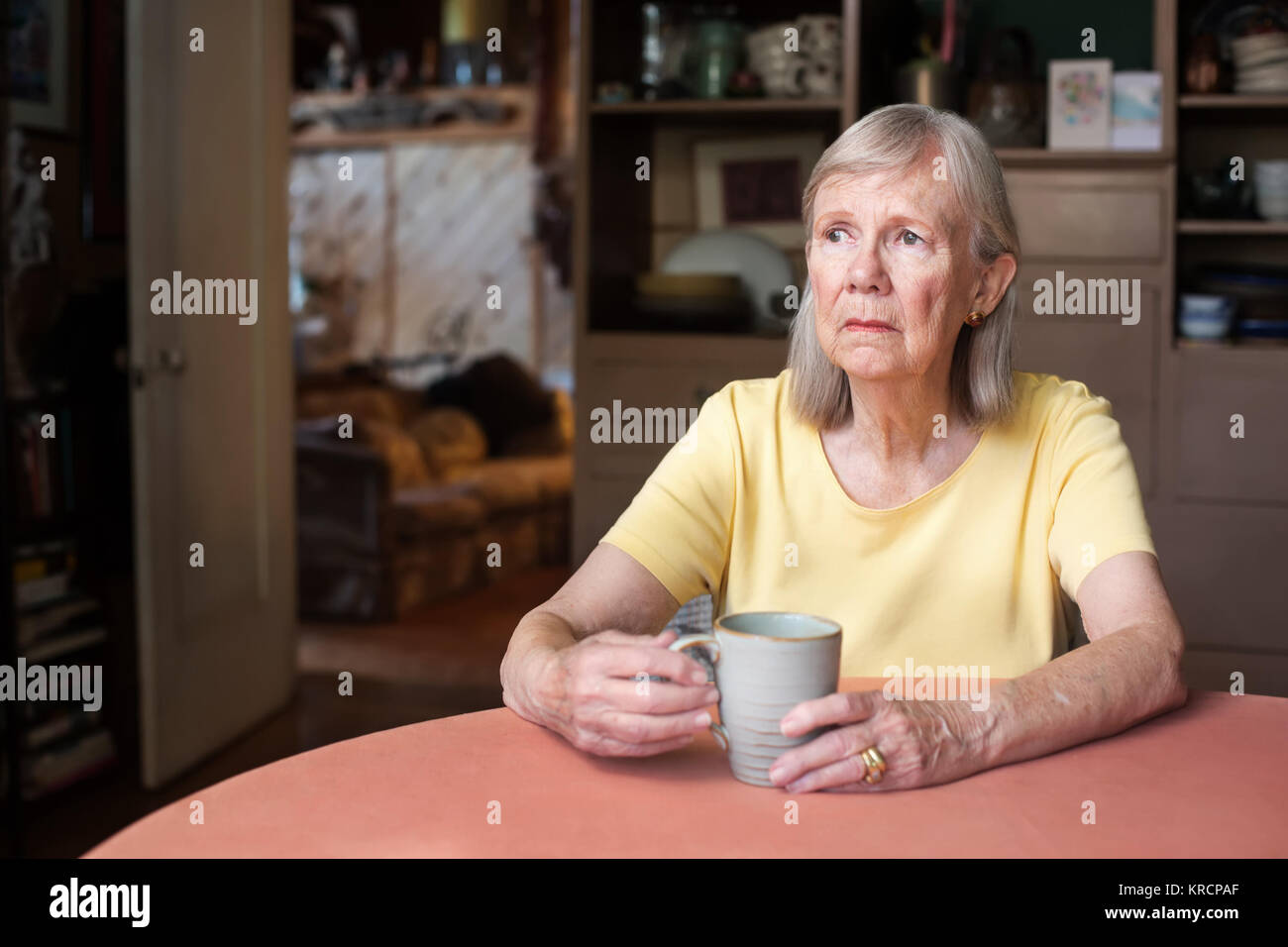 Senior woman with blank stare Stock Photo - Alamy