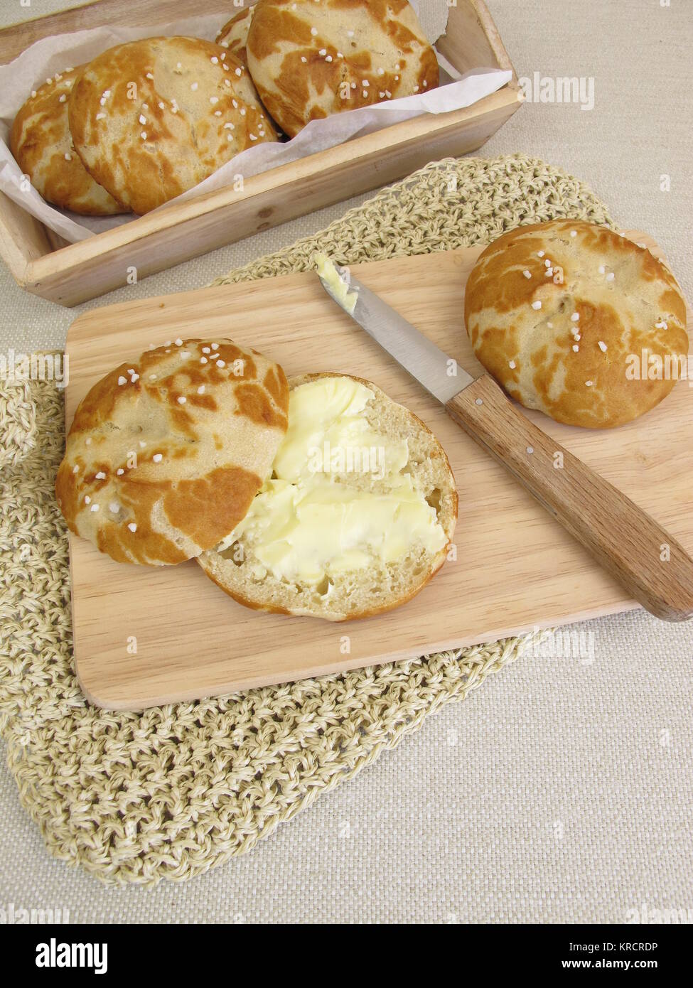 sliced u200bu200bself-baked lye roll with butter Stock Photo - Alamy