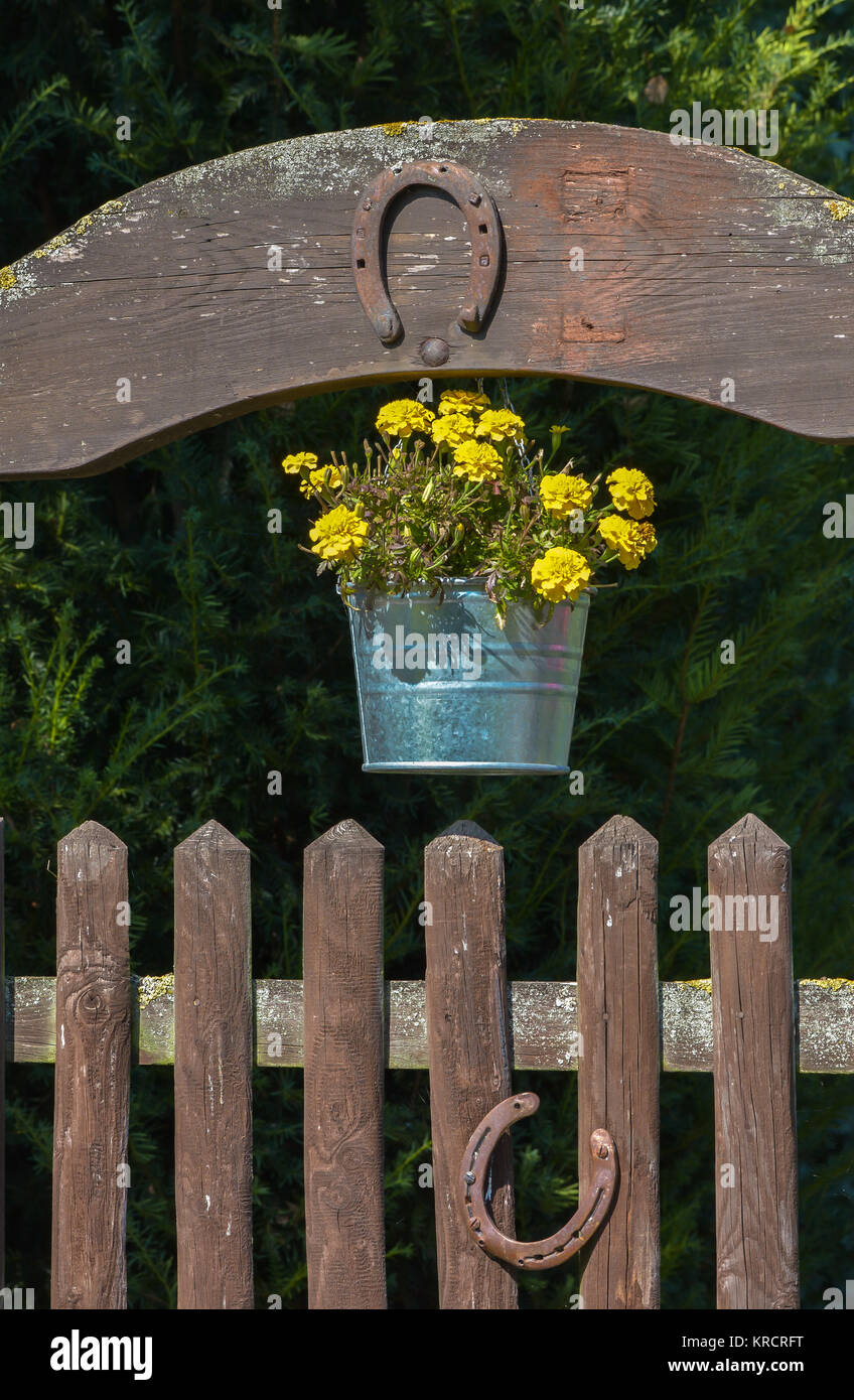 hanging basket at the gate Stock Photo - Alamy