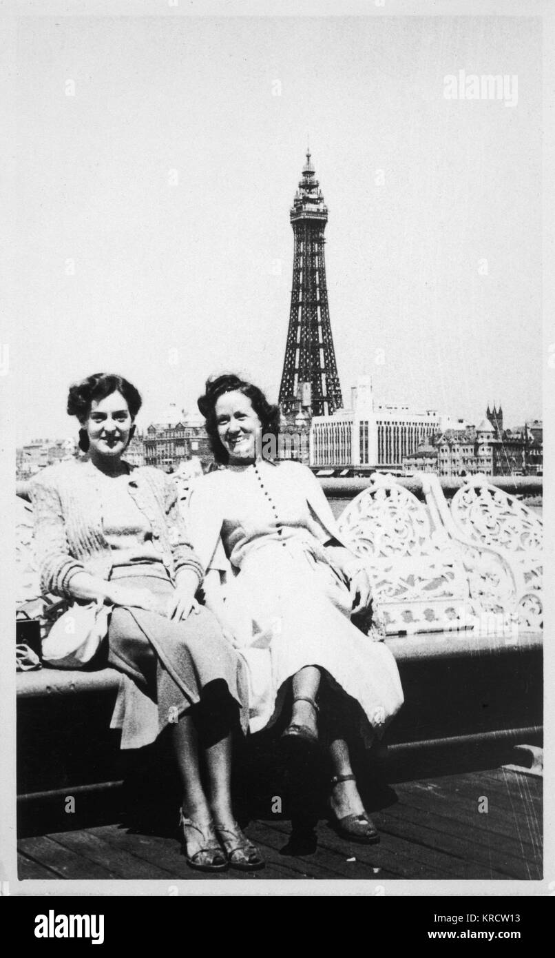 Two friends on a bench at Blackpool, Lancashire Stock Photo - Alamy