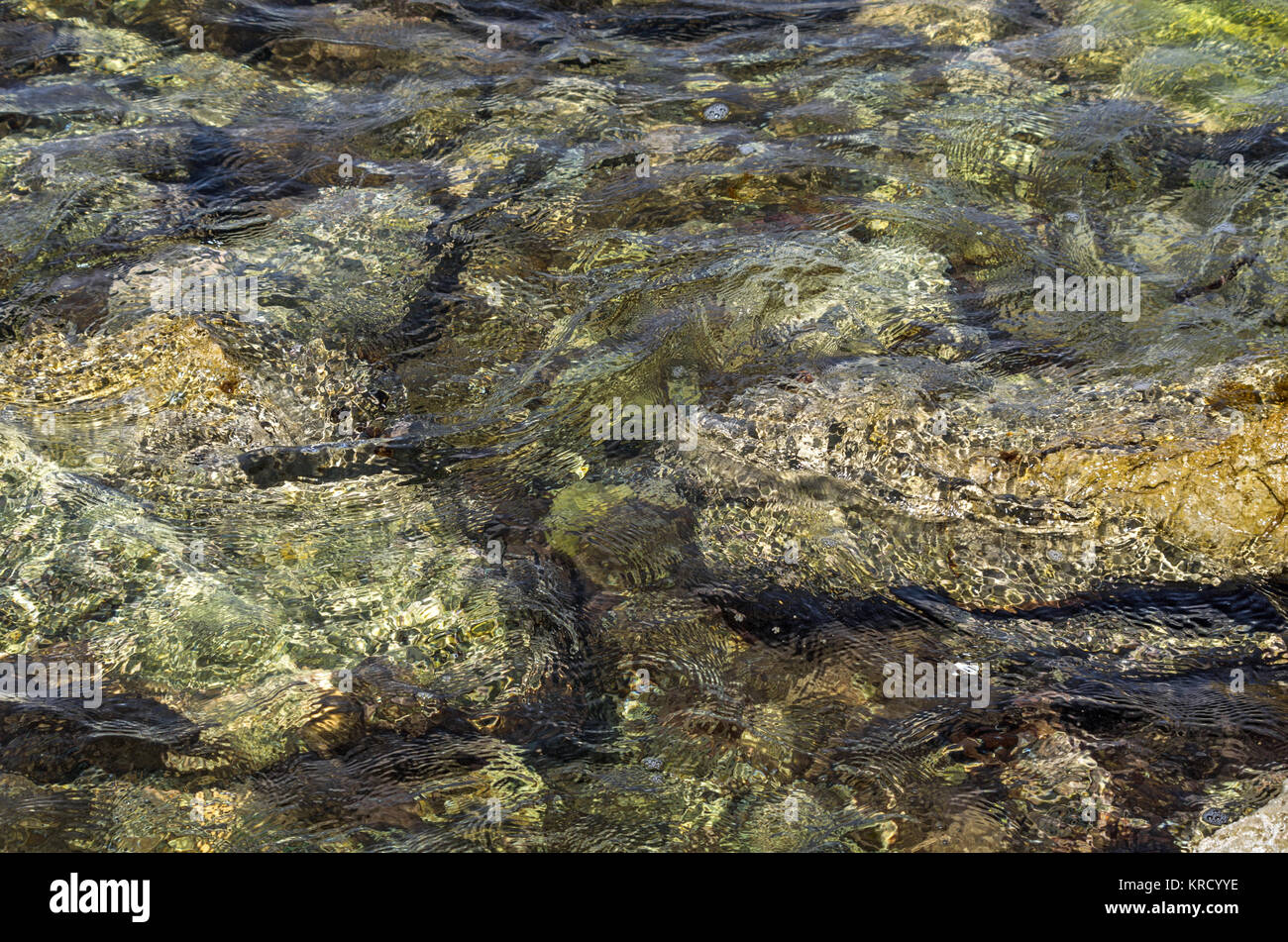 rocks in water Stock Photo - Alamy