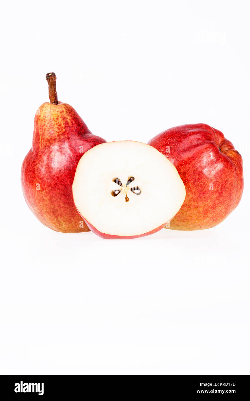 Two and half fruits of red pear isolated on white background Stock ...