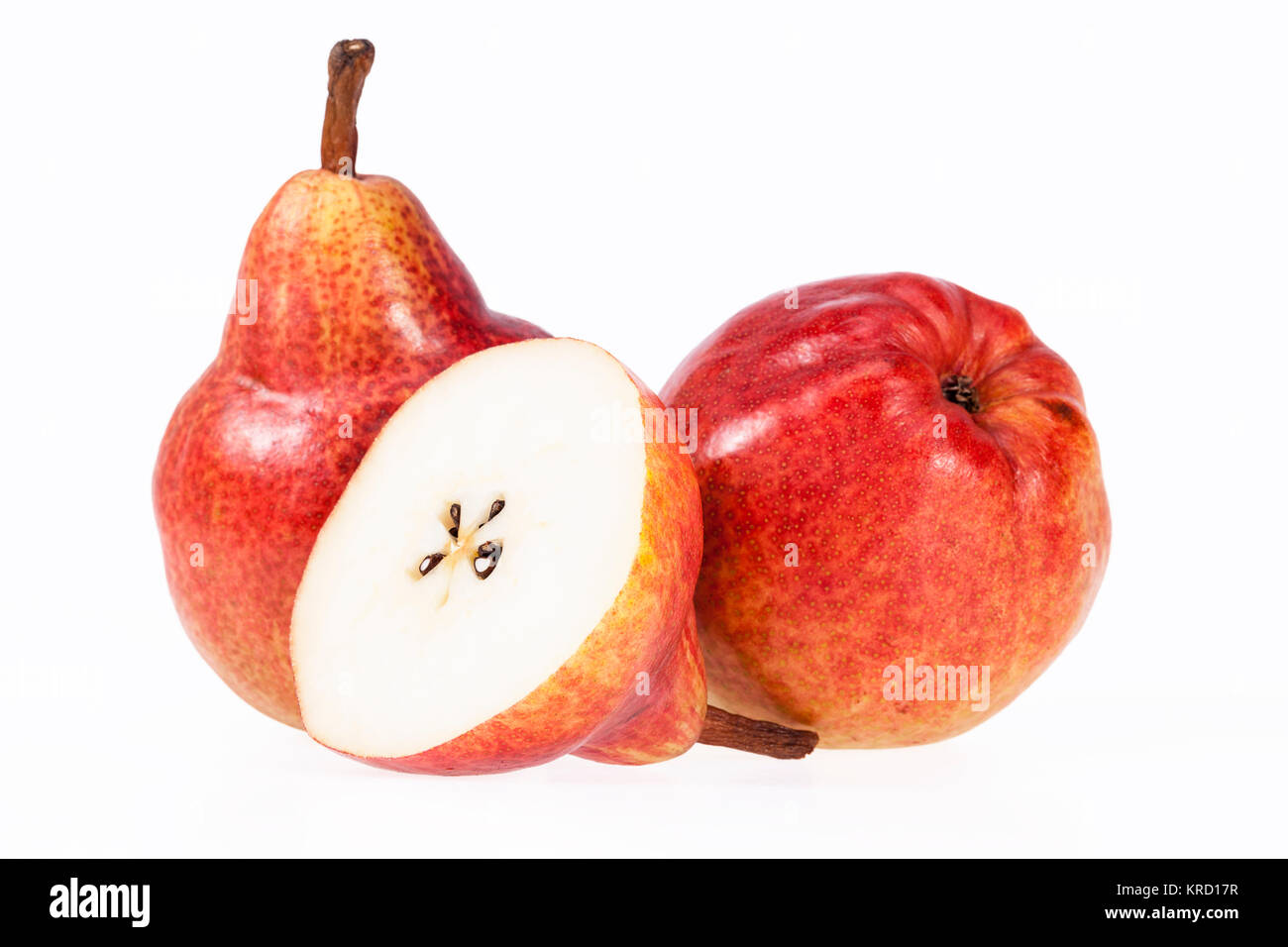 Two and half fruits of red pear isolated on white background Stock ...